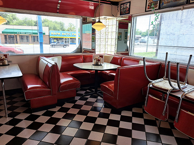 Corner booths: where family memories are made over pancakes and coffee. The red vinyl practically whispers, "Stay awhile, order dessert."