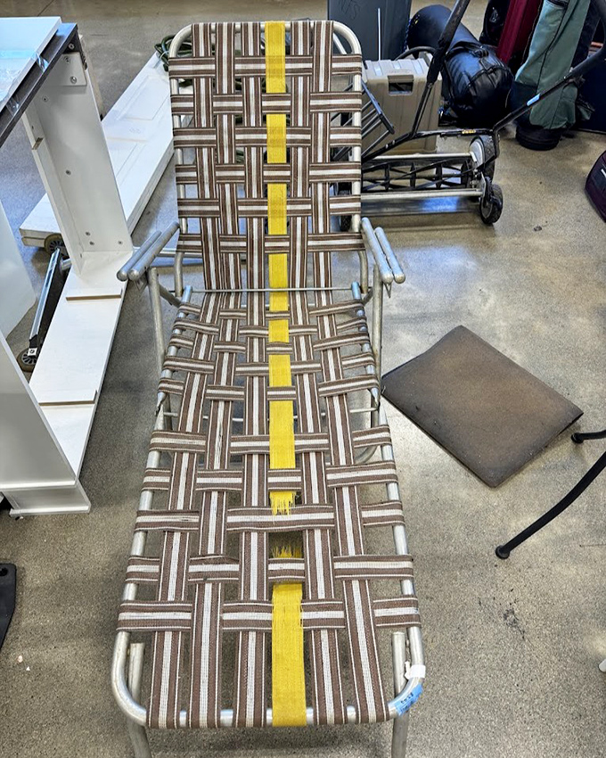 This retro lounger with its brown-and-yellow webbing isn't just furniture&mdash;it's a time machine to 1970s backyard cookouts and sunburned naps. 