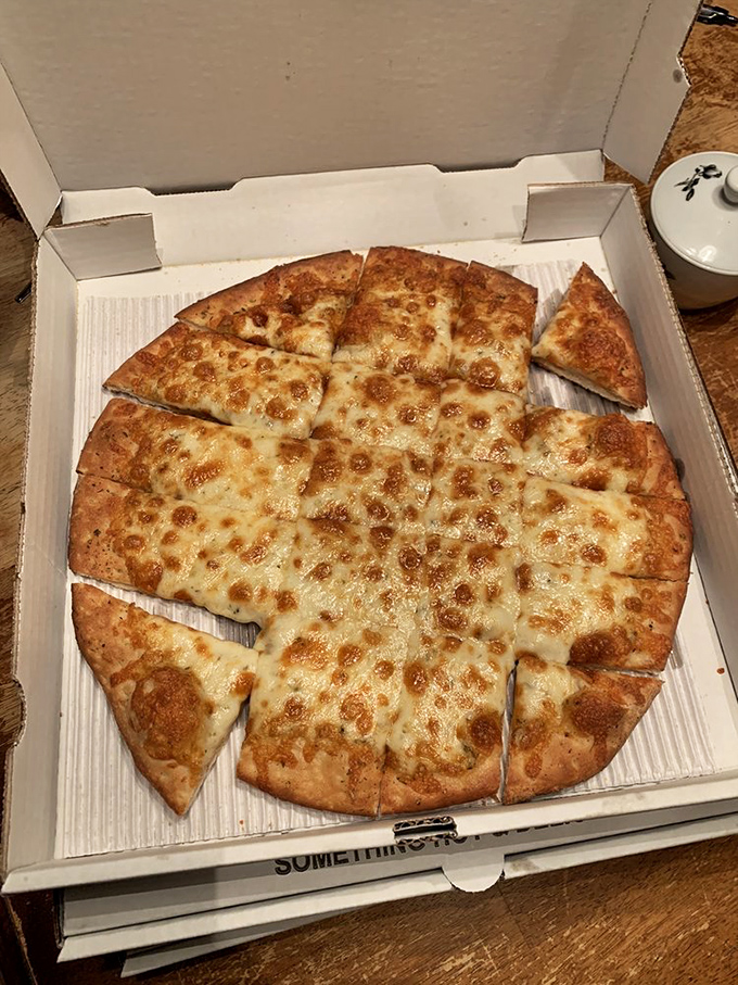 Simplicity at its most sublime. This cheese pizza proves that sometimes the classics need no embellishment to achieve greatness.