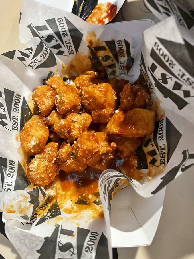Golden-fried chicken chunks glistening with sauce&mdash;like little flavor bombs waiting to detonate on your taste buds. Resistance is futile.