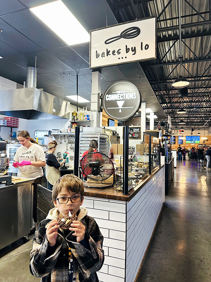 The look of pure concentration as this young connoisseur savors his chocolate treat tells you everything you need to know about Bakes by Lo.