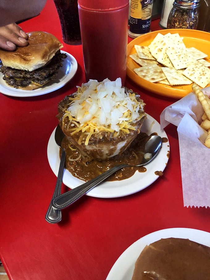 A bowl of Casper's legendary chili topped with cheese and onions—the kind of meal that makes you understand why people have been coming here for generations.
