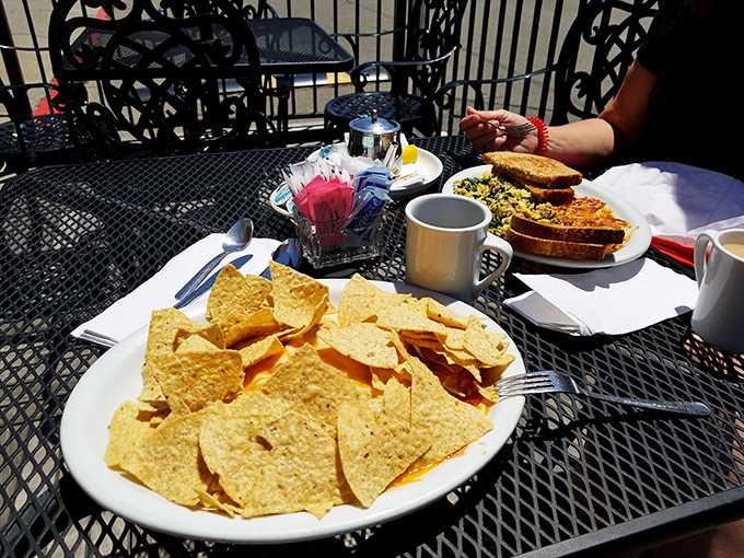 Outdoor dining with a side of sunshine and tortilla chips&mdash;proof that some of life's best moments happen at simple tables with good food.