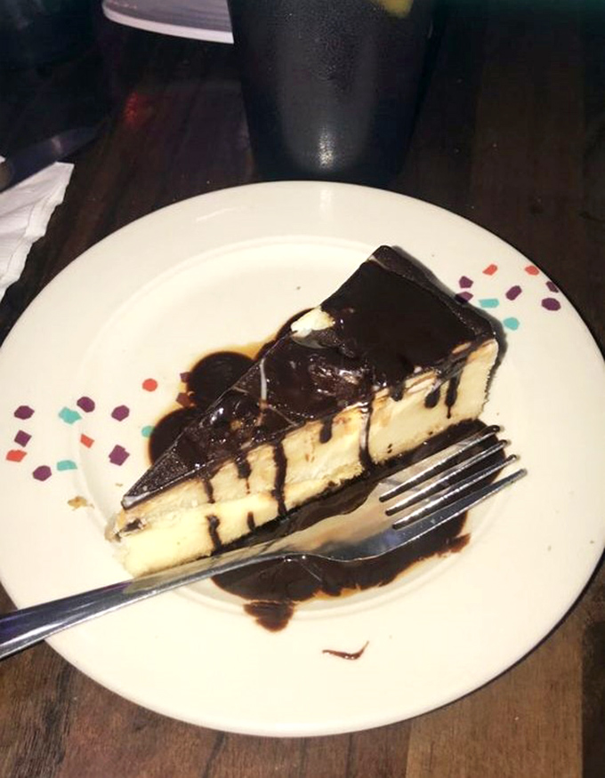 A chocolate cheesecake that doesn't just satisfy your sweet tooth&mdash;it makes it write thank-you notes. That chocolate drizzle is pure edible artistry.