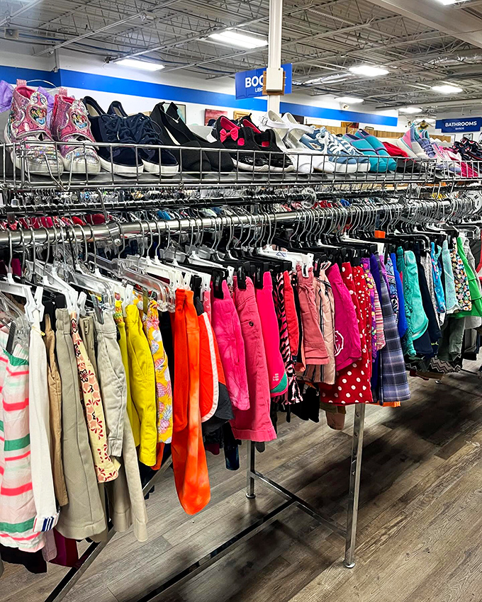The children's clothing section explodes with color like a rainbow after a storm. Those tiny Tennessee Titans jerseys are raising the next generation right.