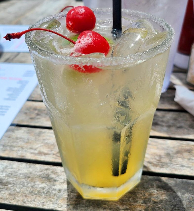 A cocktail that looks like summer vacation decided to take up residence in a glass.