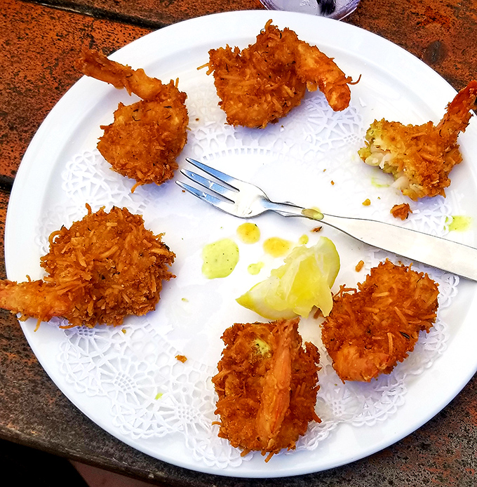 Coconut shrimp arranged like a delicious clock face. Each crispy morsel is a reminder that fried food done right is worth every calorie.