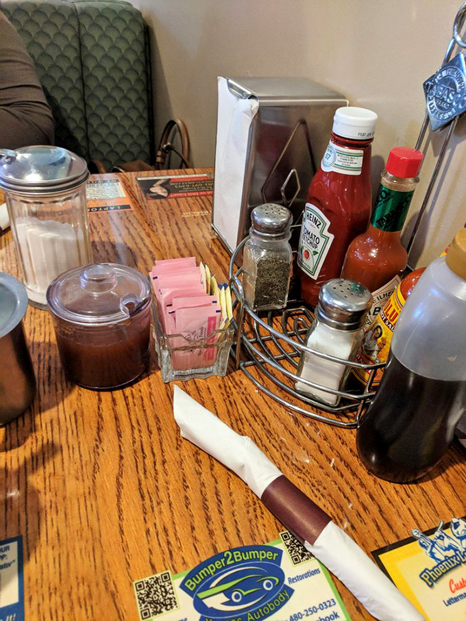 The condiment caddy&mdash;that tabletop United Nations of flavor where ketchup, hot sauce, and salt negotiate the terms of your meal's final taste.