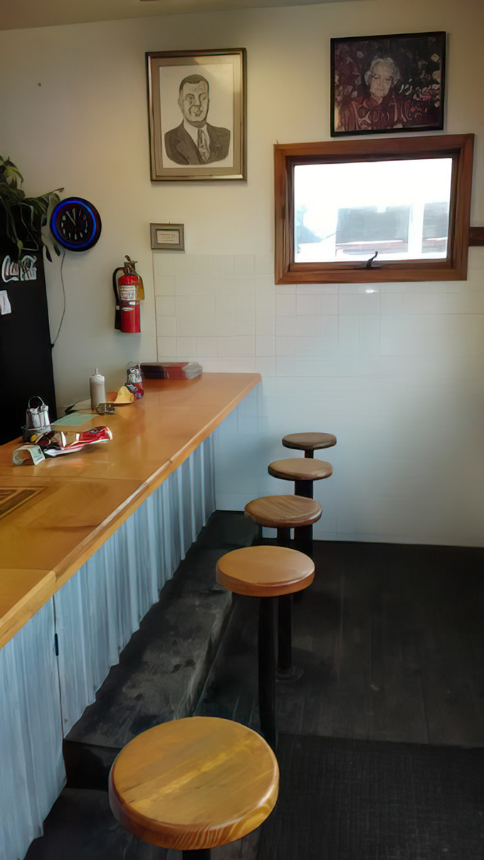 Counter seating that invites conversation with strangers who quickly become friends united by the universal language of great burgers.