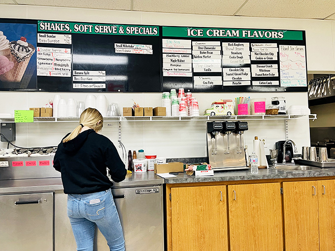 Behind every great ice cream experience is someone working magic at the counter. The anticipation builds as orders are prepared.