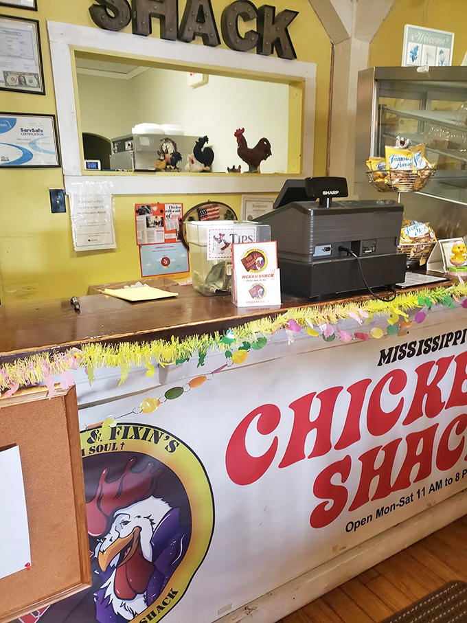 Where chicken dreams come true. The ordering counter showcases the restaurant's playful personality with rooster decorations standing guard.