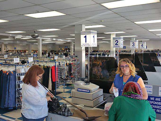 Numbered checkout stations bring order to the joyful chaos, like friendly lighthouses guiding shoppers safely to shore.