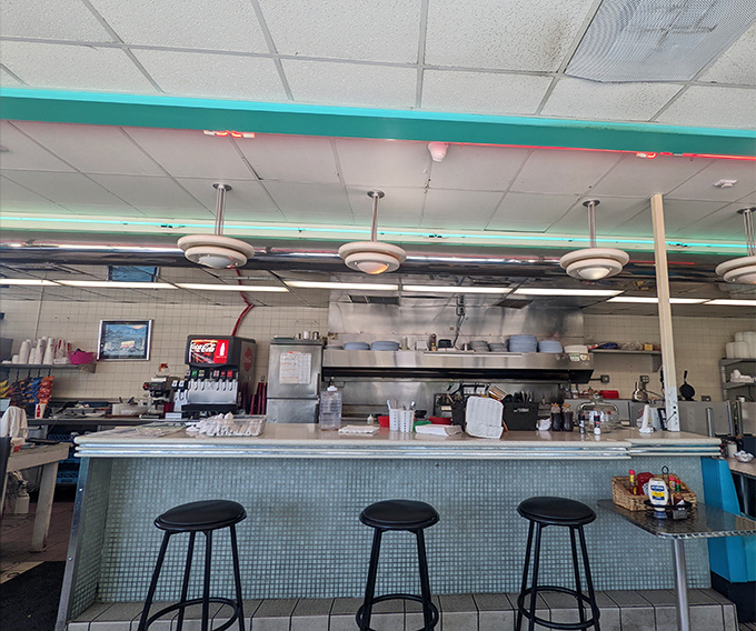 Counter seating: front-row tickets to the greatest show on earth&mdash;breakfast being made. The sizzle soundtrack is complimentary with every meal.