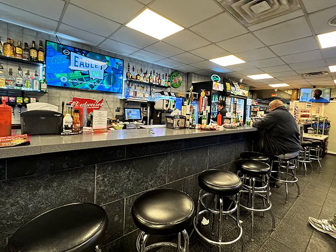 Where Eagles fans and food lovers unite at the counter, bonding over sizzling beef and sports debates with equal passion.