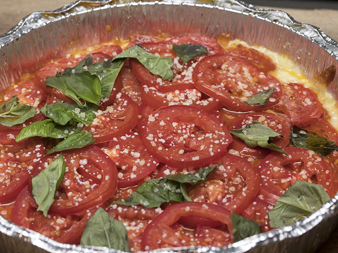 Two pizza styles, one kitchen's mastery &ndash; proof that excellence comes in many delicious forms and creative variations.