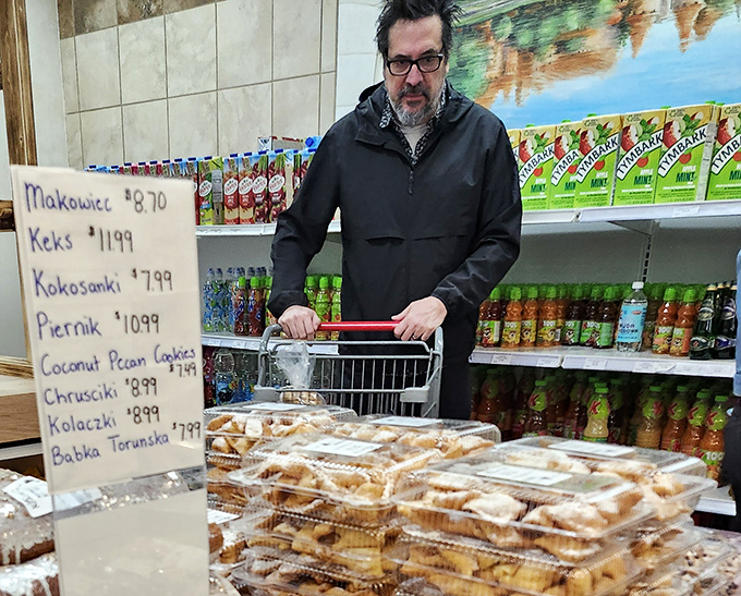 Shopping for authentic Polish treats becomes a serious mission. The concentration on this shopper's face says it all—pierogi selection is no laughing matter.