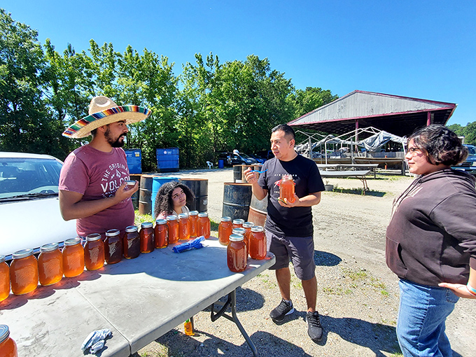 The outdoor honey vendor creates that perfect flea market moment&mdash;strangers connecting over something sweet and locally made.