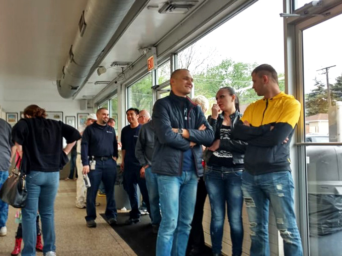 The lunch rush democracy: everyone equal in the eyes of the hot dog gods.