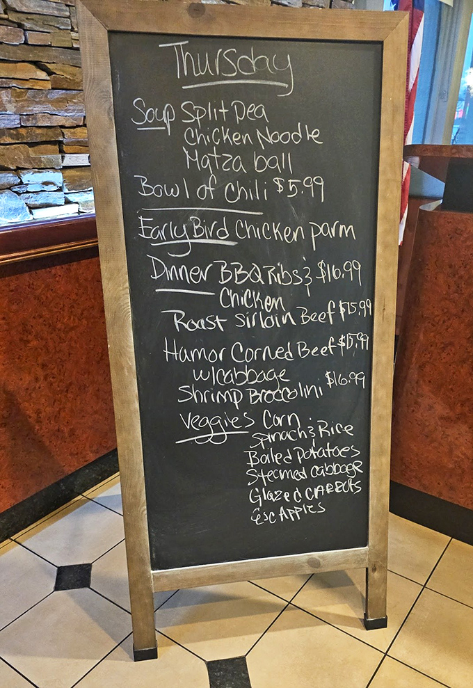 The daily specials board—a handwritten love letter to comfort food classics that changes with the day but always speaks the universal language of satisfaction.