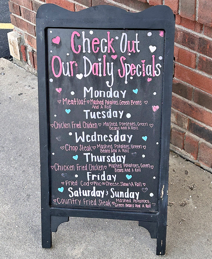 The daily specials board, decorated with hearts, reveals the secret: this place doesn't just serve comfort food&mdash;it serves love.