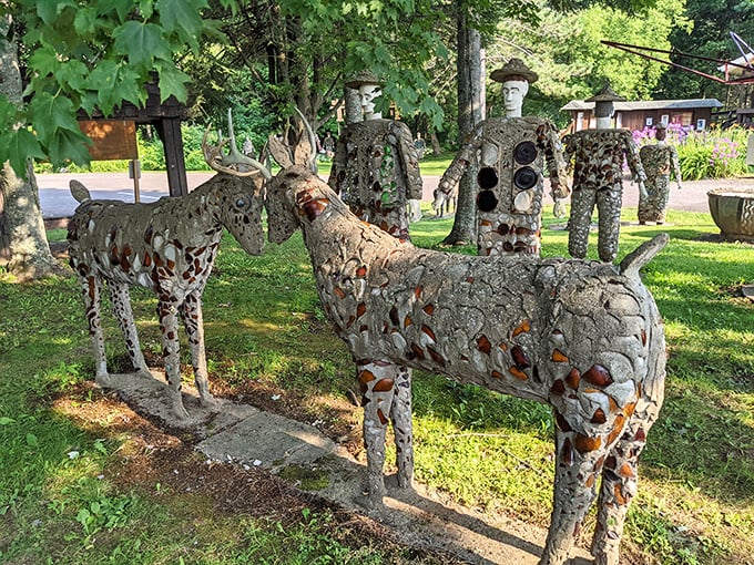 These concrete deer stand eternally alert, their bottle-studded bodies catching the light like woodland creatures dressed for a glamorous forest gala.