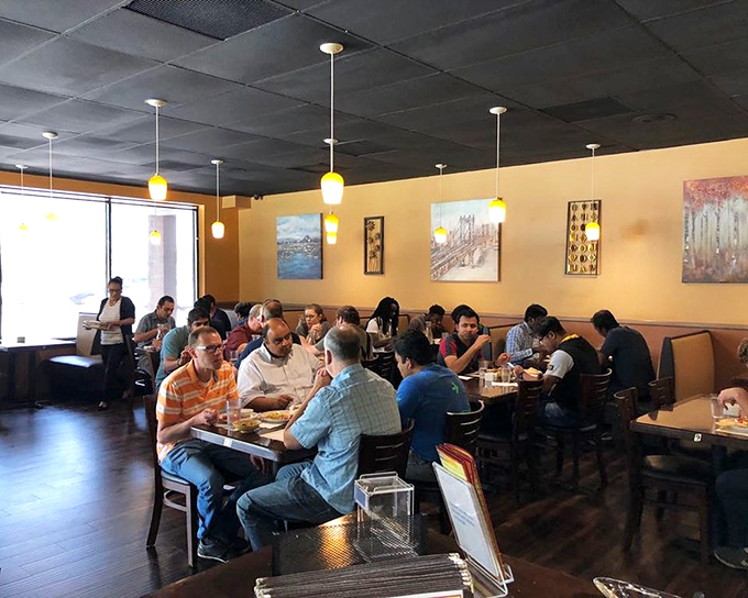 Lunchtime at Layla's—where Columbus residents know that the best business deals are sealed over plates of perfectly spiced curries.