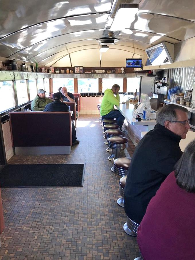 Morning regulars solving world problems one coffee refill at a time. The real town hall meetings happen over breakfast.