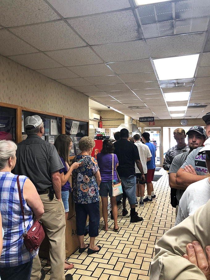 The lunch rush at Melvin's isn't just a crowd; it's a cross-section of Elizabethtown life, united by the universal language of great burgers.