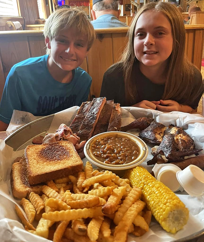 The universal language of barbecue bringing generations together. That tray isn't just holding food&mdash;it's creating memories that will outlast the meal.