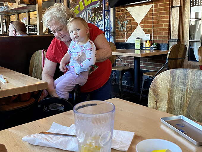 Three generations enjoying lunch together &ndash; the universal language of good food bringing families closer one pickle spear at a time.