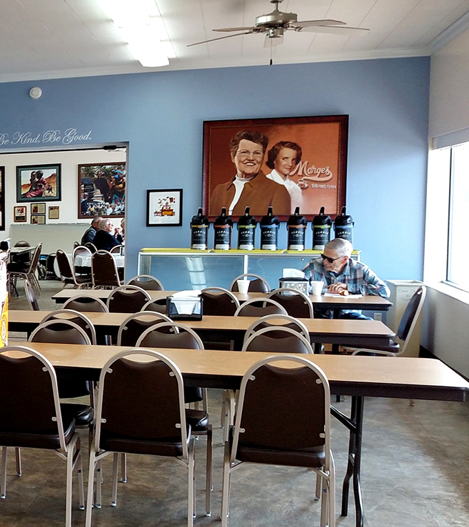 The blue walls and comfortable seating create a homey atmosphere where regulars solve the world's problems over coffee and crullers.