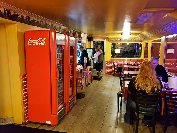 Evening at Swinging Door transforms the humble space into something almost magical, where strangers become friends united by their love of good BBQ.