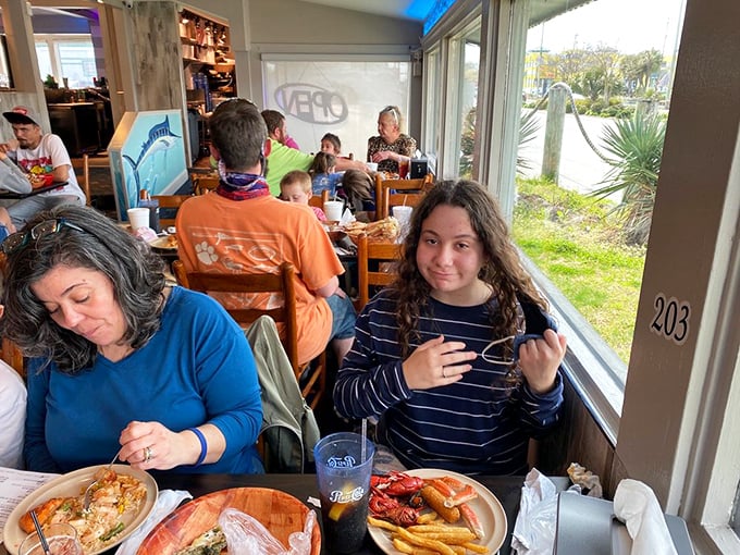 Where family memories are made one crab leg at a time. That window view is just a bonus to the seafood spectacle on the table.