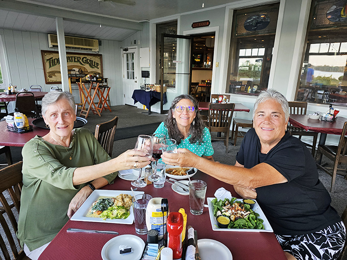 Toasting to good times with good company&mdash;the universal language of happiness. These diners know the secret: food tastes better when shared with friends.