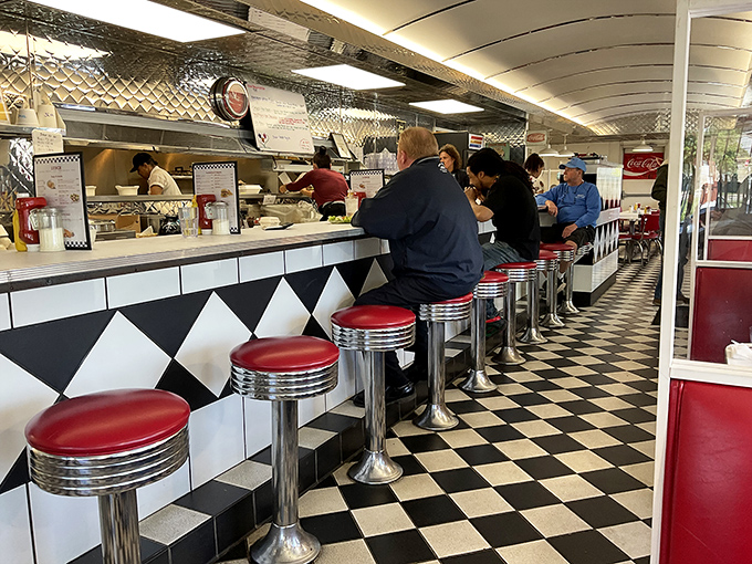 The counter seating&mdash;where solo diners become temporary neighbors and the short-order ballet unfolds before your eyes. Front-row seats to breakfast theater.