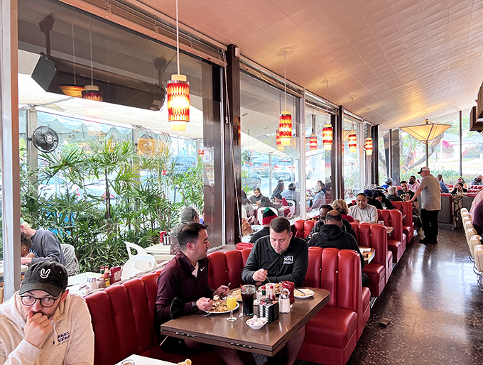 Every booth tells a story at Pann's, where regulars become family and first-timers quickly understand why this place has outlasted countless food trends.