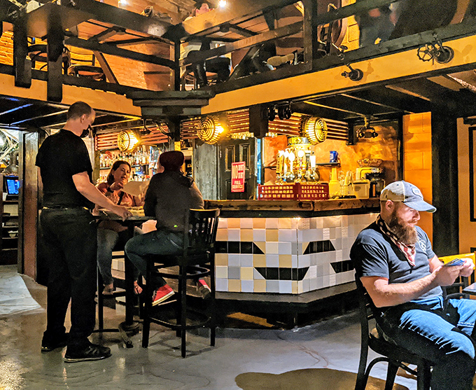 The bar scene at Bube's&mdash;where strangers become friends and friends become regulars over pints of history-infused brews.