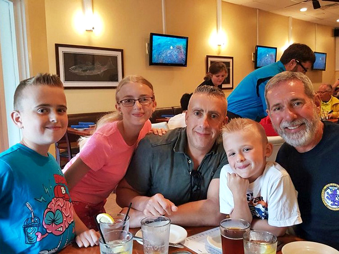 The true test of any restaurant: families making memories over great food. Those smiles suggest the seafood passed with flying colors.