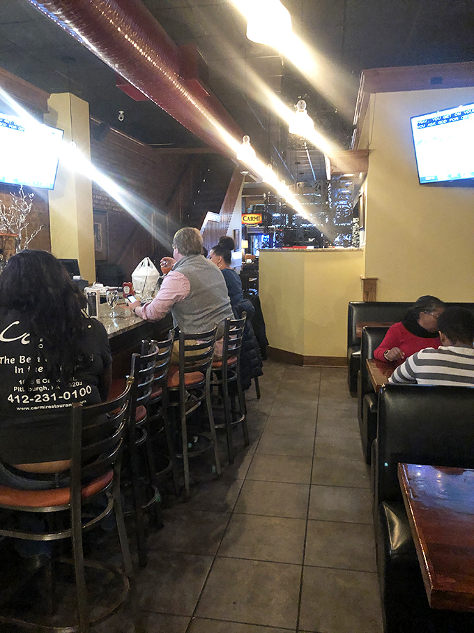 Where strangers become friends over shared tables and the mutual understanding that calories consumed while traveling don't count.