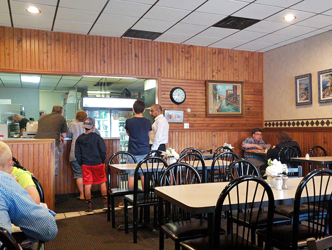 The dining room hums with the energy of regulars and newcomers alike, all united in the universal language of "mmm" and "pass the bread."