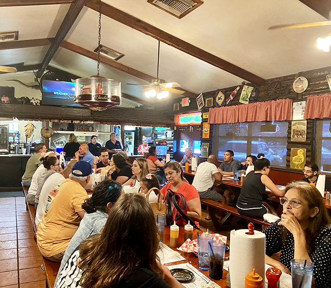 The packed dining room tells you everything you need to know—locals don't keep secrets when the barbecue is this good.