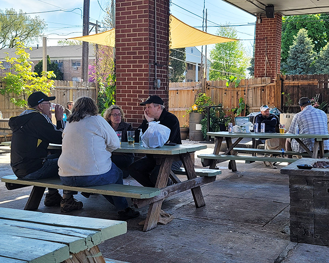 The universal language of BBQ brings people together. That silence you hear? It's the sound of folks having religious experiences with their ribs.