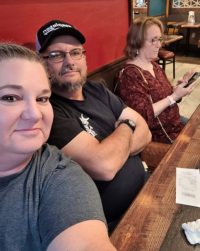 The true measure of a restaurant isn't just its food but the people who gather there. These diners aren't just eating; they're participating in a shared ritual.