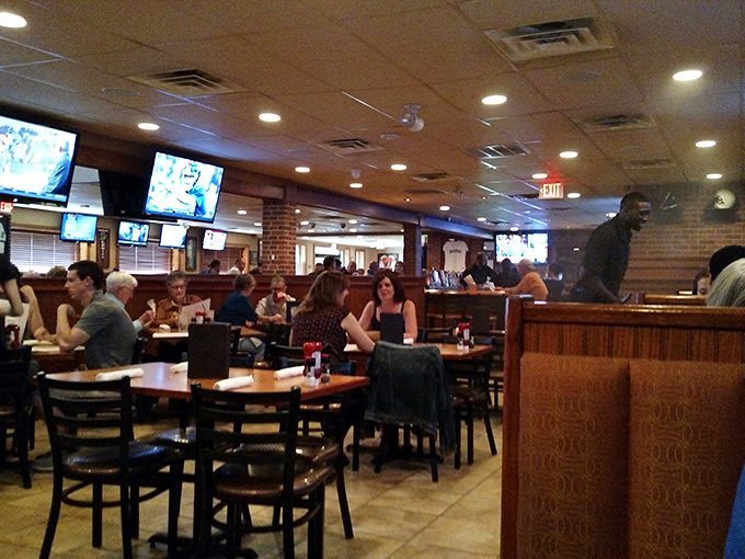 The true measure of a great sports bar: happy patrons engaged in that perfect balance of game-watching and conversation. Community in action.