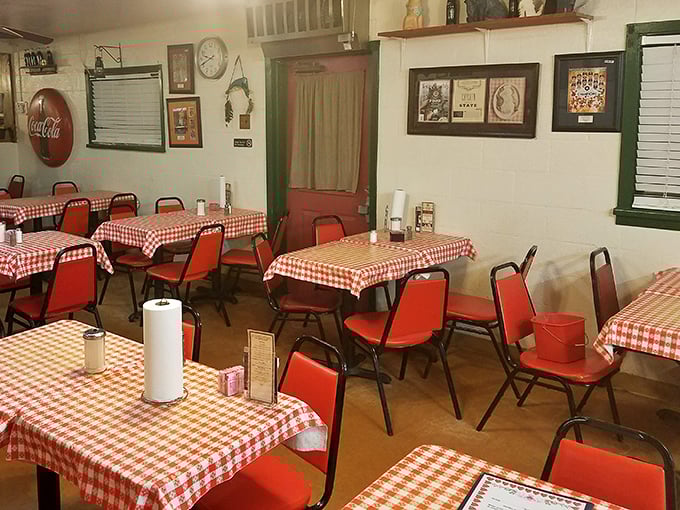 Red chairs and checkered tablecloths create that classic diner vibe where calories don't count and diet talk is strictly prohibited.