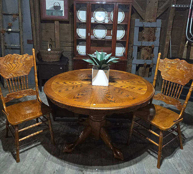 Dining set perfection! This oak table and pressed-back chairs await a family who appreciates second chances and Sunday pot roasts.