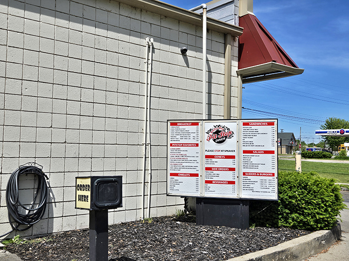 Even the drive-thru menu board maintains that classic diner aesthetic. For when you need your comfort food fix but can't spare the time to linger.