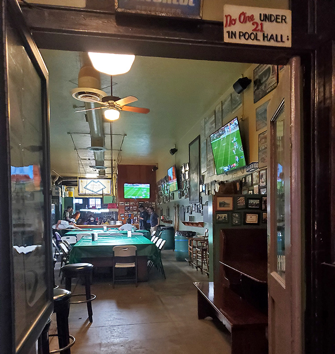 "No One Under 21 In Pool Hall" announces the sign, guarding the entrance to a sanctuary where the gentle click of billiard balls has provided the soundtrack for decades.