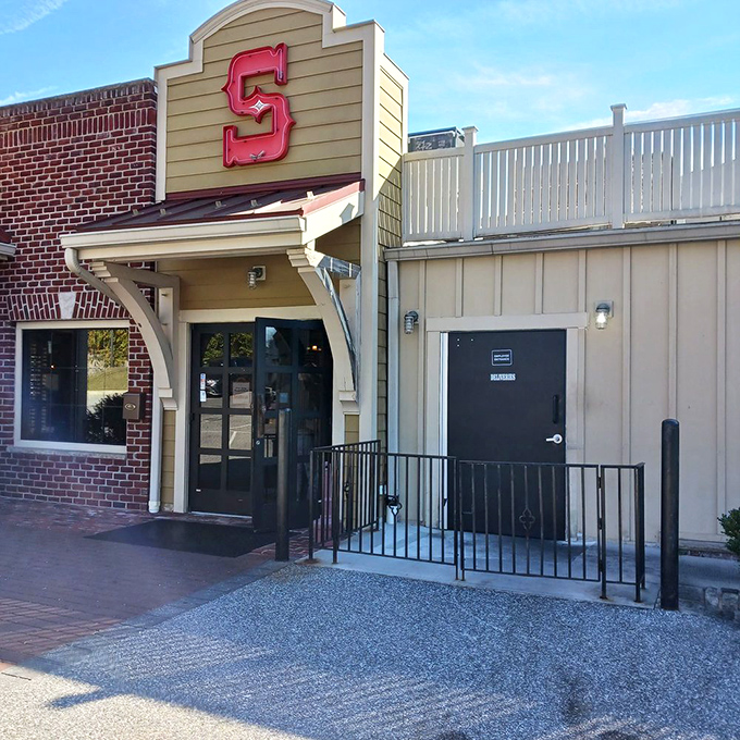 The iconic red "S" sign beckons hungry travelers like a lighthouse guiding ships to safe harbor&mdash;except this harbor serves crab cakes.
