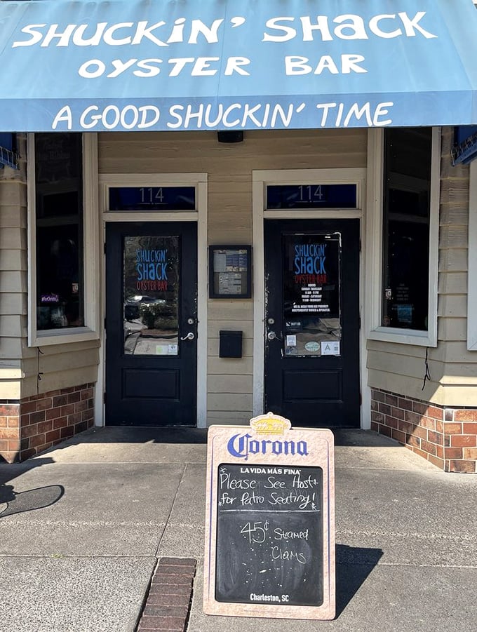 Two doors, one promise: beyond this entrance lies seafood happiness. The Corona sign is just a bonus.